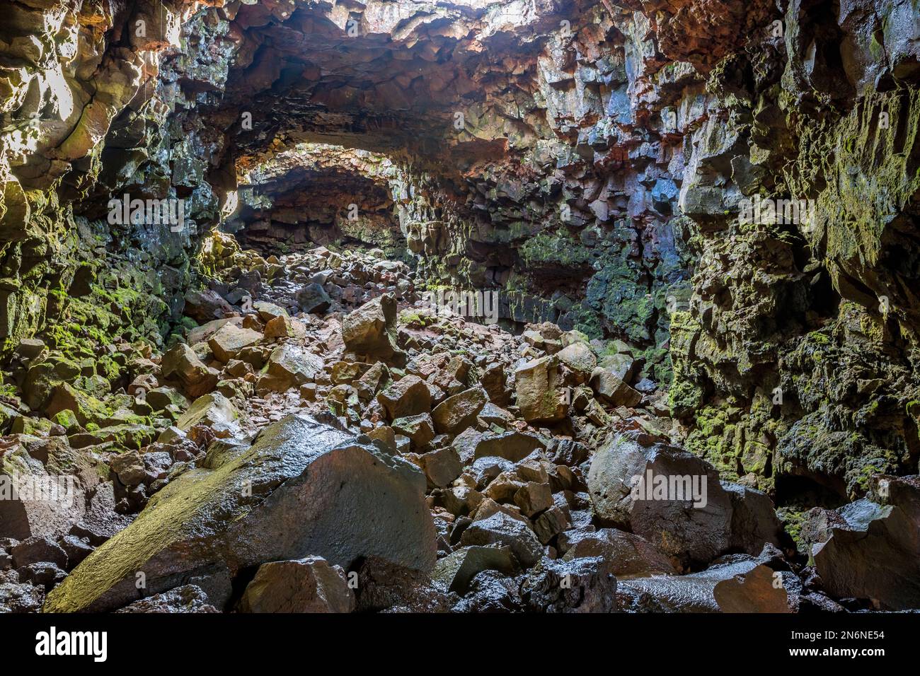 Visiting a lava cave in Sothern Iceland. Beautiful stone tunnel and ...