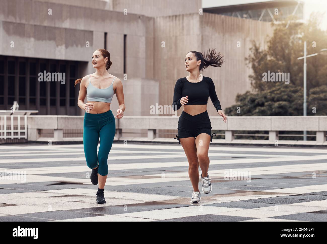 Fitness, city and friends running together for wellness, energy or ...