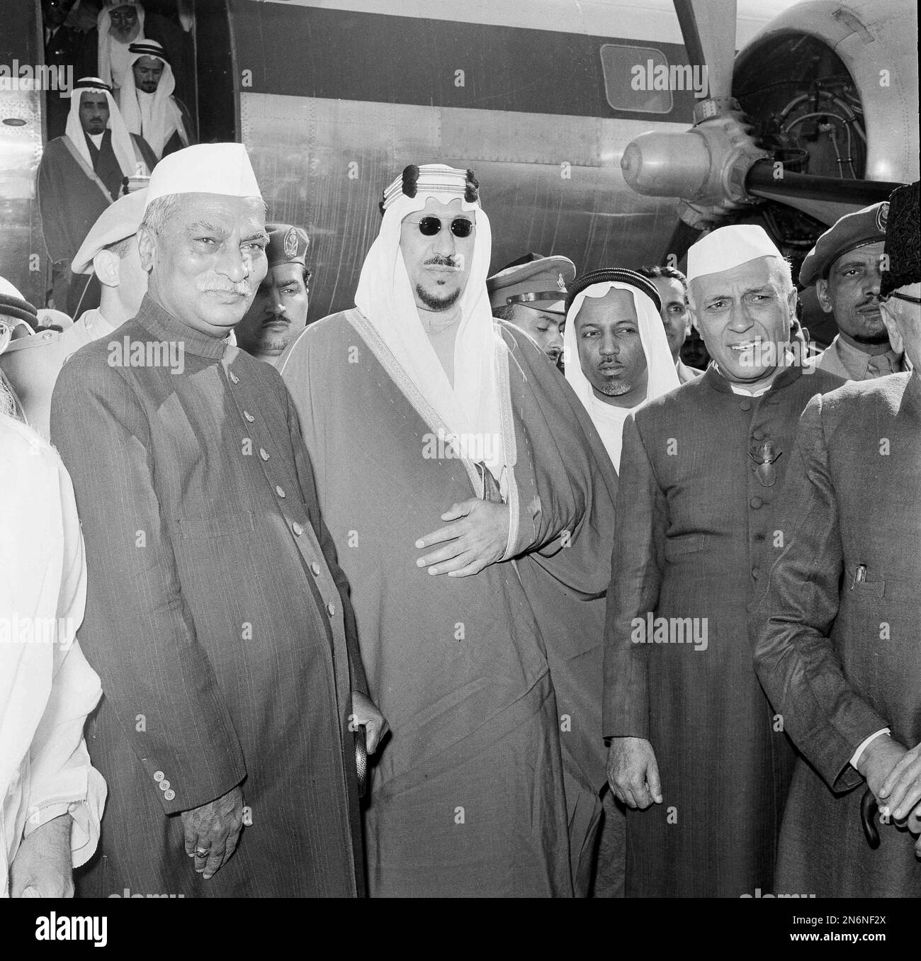 King Saud of Saudi Arabia, who is making a 17-day tour of India, is flanked by President ...