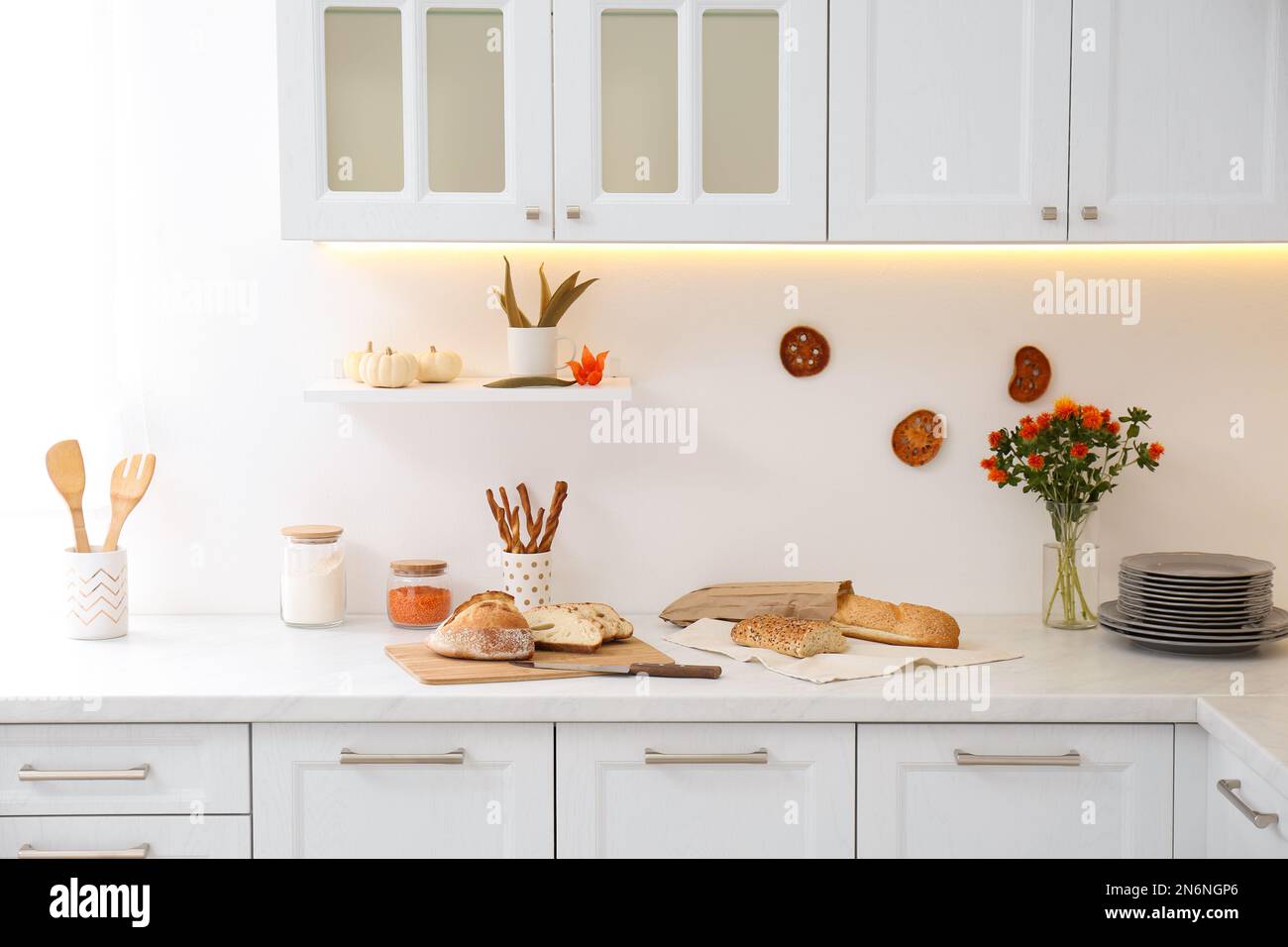 Modern kitchen interior with products on counter Stock Photo - Alamy