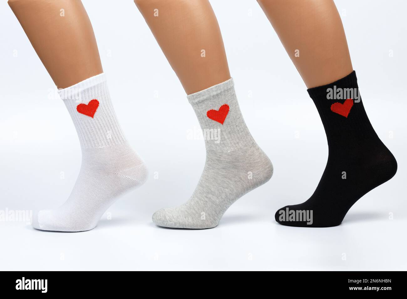 Socks on a white background. Socks on the leg Stock Photo - Alamy