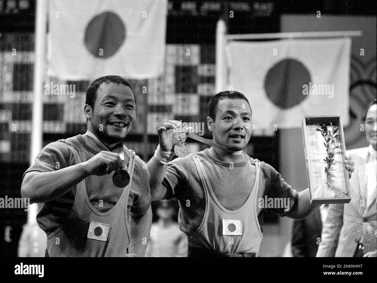 FILE - In this Oct. 14, 1968, Japanese weightlifters, Yoshiyuki Miyake ...