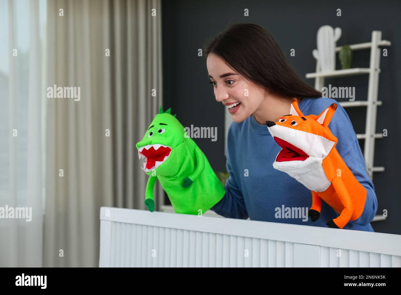 Puppet dragon hand hi-res stock photography and images - Alamy