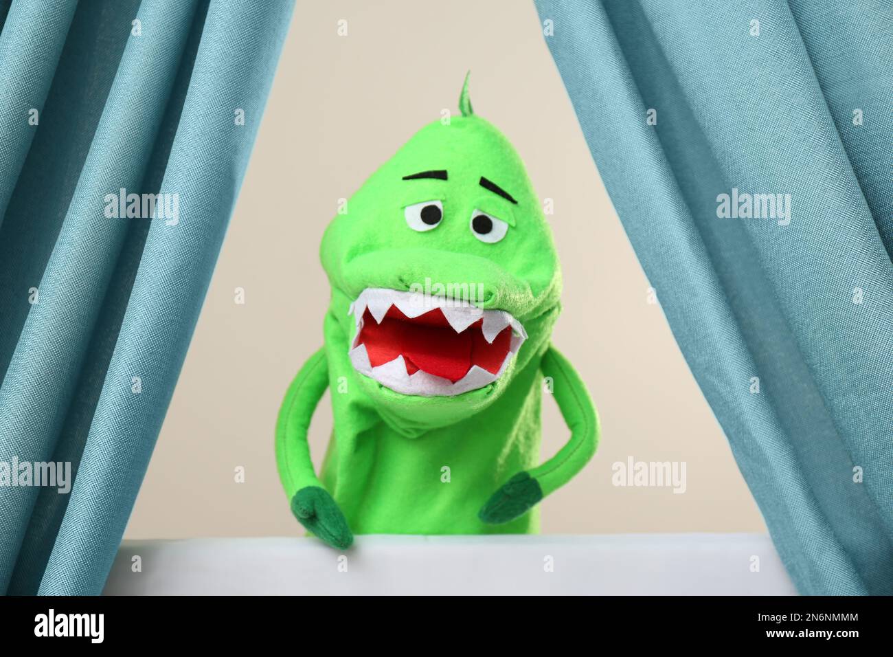 Creative puppet show on white stage indoors Stock Photo - Alamy