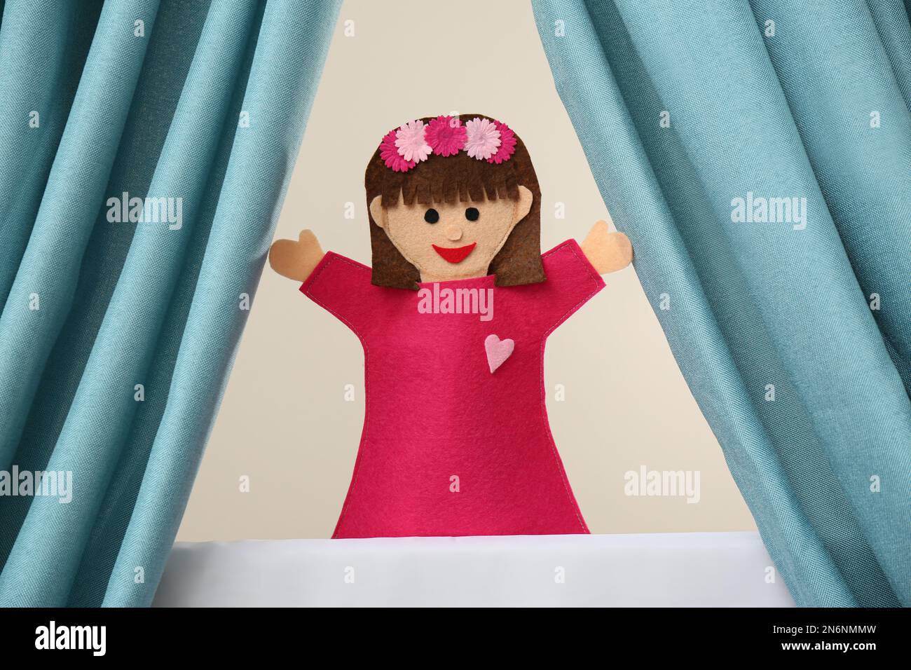 Creative puppet show on white stage indoors Stock Photo - Alamy