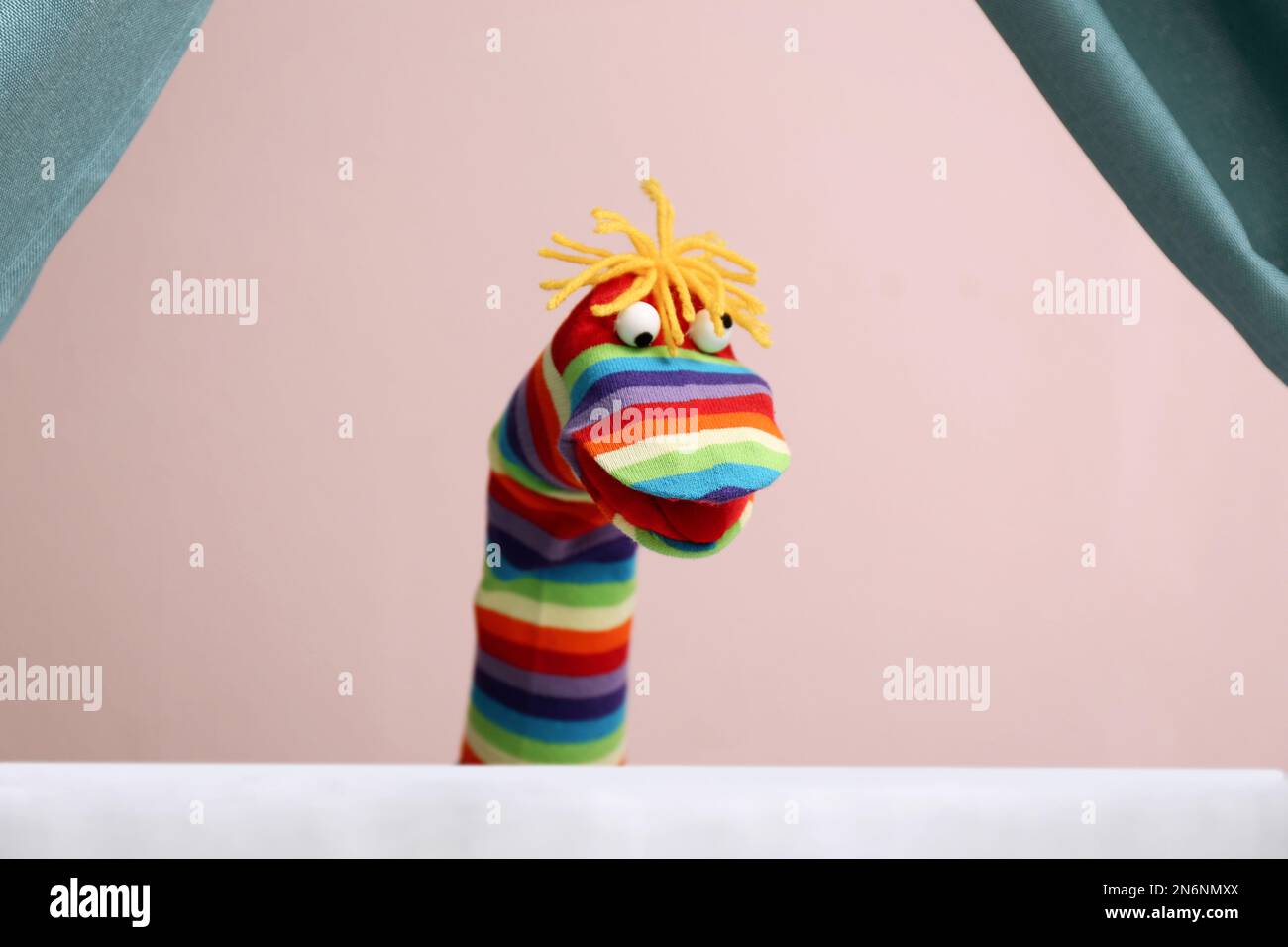 Creative puppet show on white stage indoors Stock Photo - Alamy