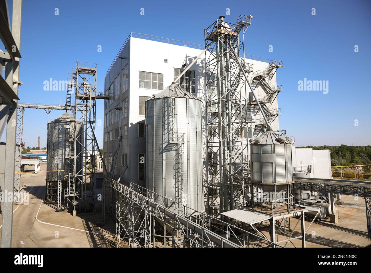 View of modern granaries for storing cereal grains outdoors Stock Photo ...