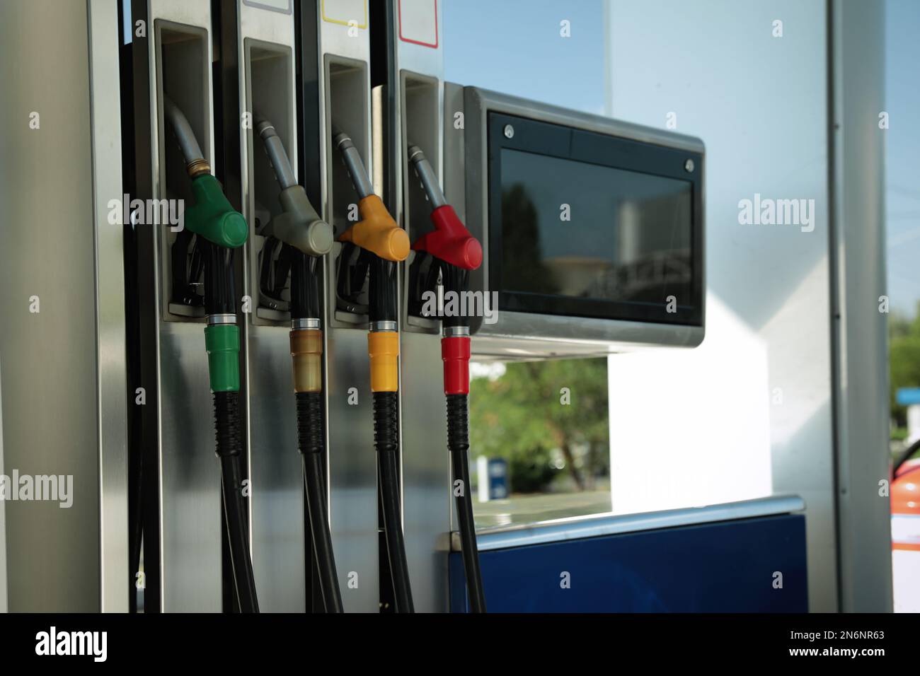 Fuel pistols at modern gas filling station Stock Photo - Alamy