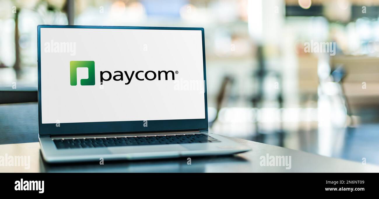 POZNAN, POL - MAY 4, 2022: Laptop computer displaying logo of Paycom ...