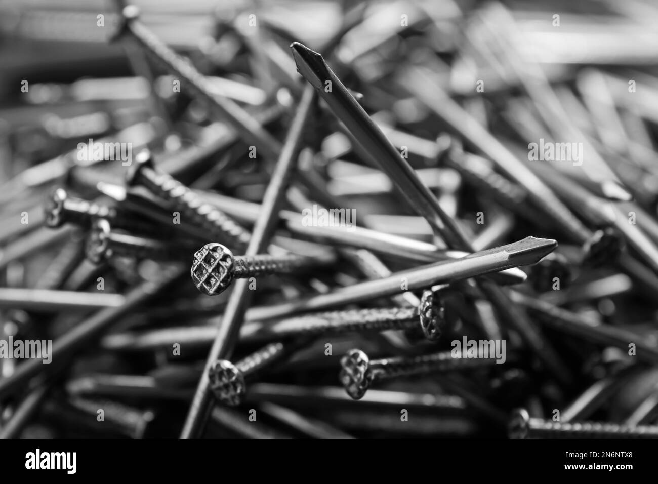 Pile of metal nails as background, closeup Stock Photo - Alamy