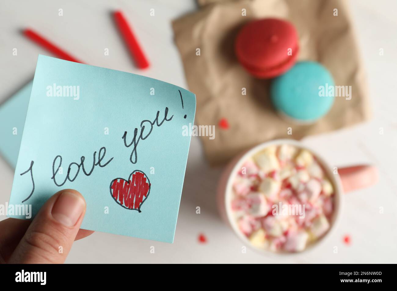 Woman holding love note hi-res stock photography and images - Alamy