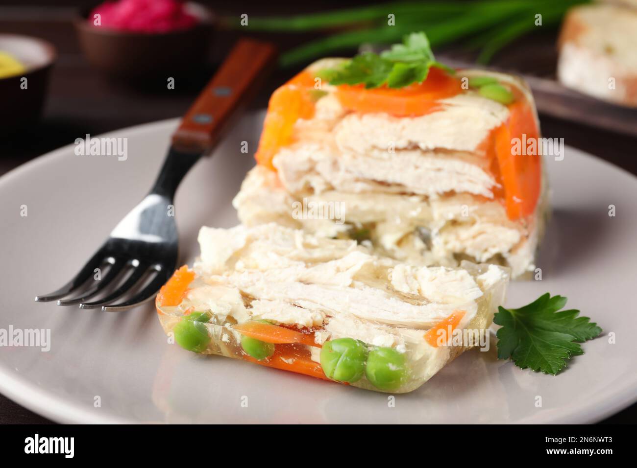 Delicious chicken aspic with vegetables on plate, closeup Stock Photo ...