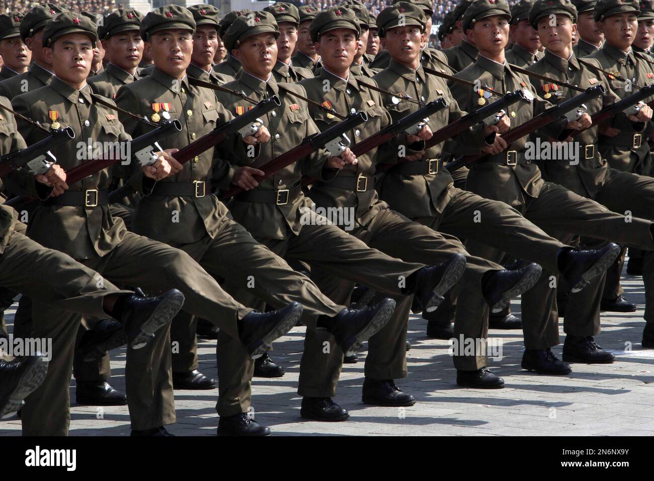 North Korean troops march during a military parade at Kim Il Sung ...
