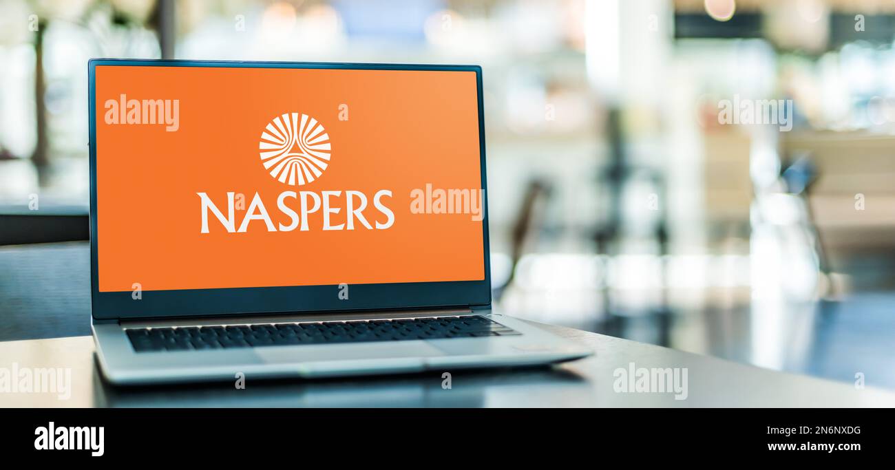 POZNAN, POL - JUN 28, 2022: Laptop computer displaying logo of Naspers ...