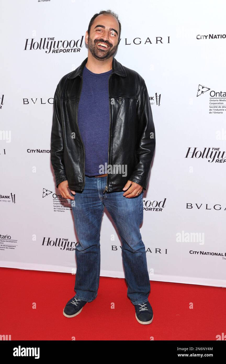 John Christou arrives at The Hollywood Reporter's Cocktail Reception ...