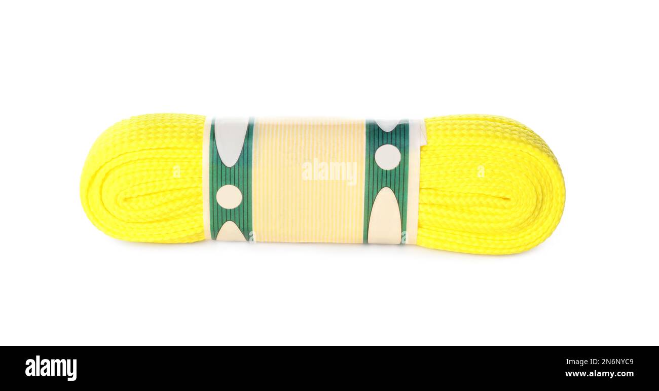 Packed yellow shoe lace isolated on white Stock Photo - Alamy