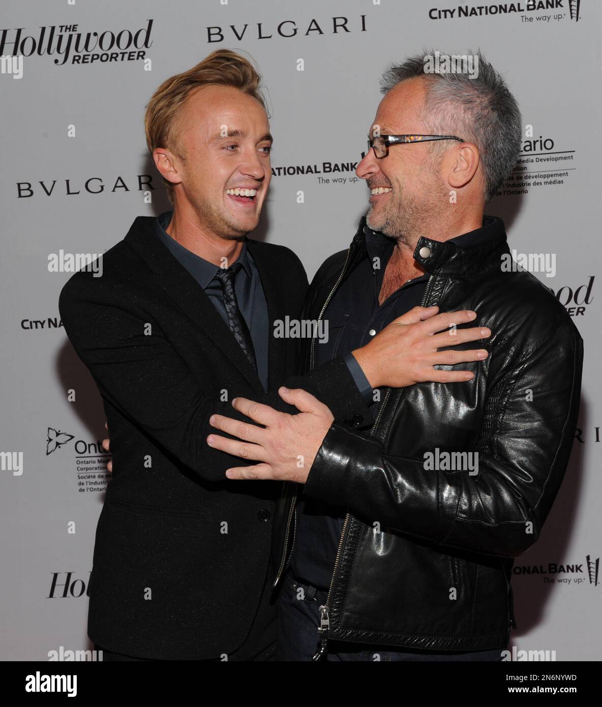 Tom Felton, left, and Charlie Stratton arrive at The Hollywood Reporter ...