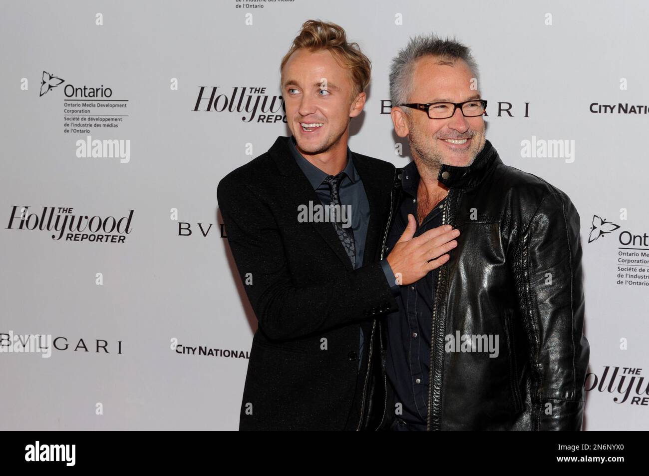 Tom Felton, left, and Charlie Stratton arrive at The Hollywood Reporter ...