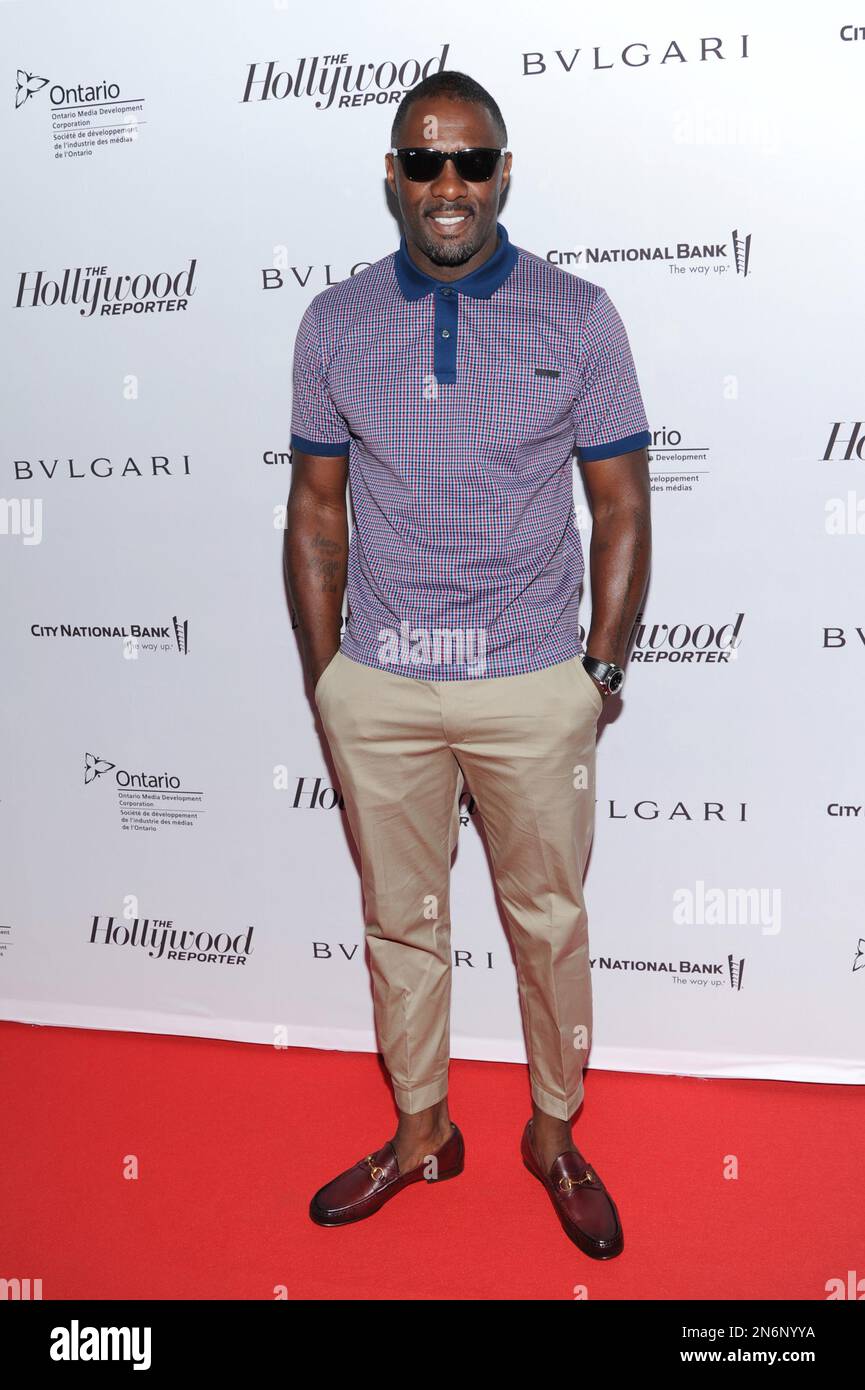 Idris Elba arrives at The Hollywood Reporter's 2013 TIFF Cocktail ...
