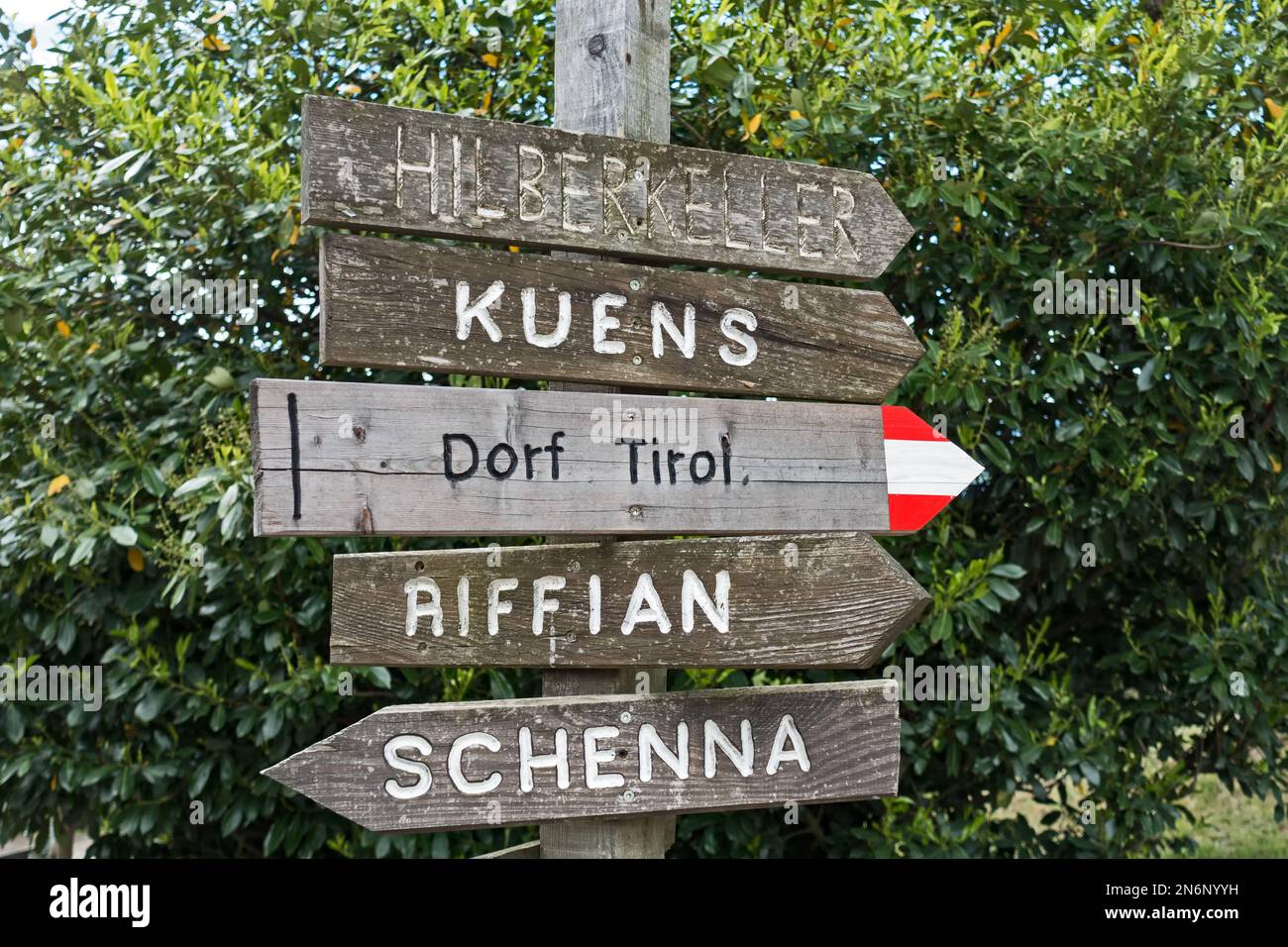 Wooden trail markers for signposting hiking trails in the Passiria ...