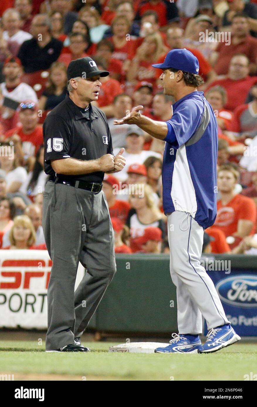 Los Angeles Dodgers manager Don Mattingly, right, has words with first ...