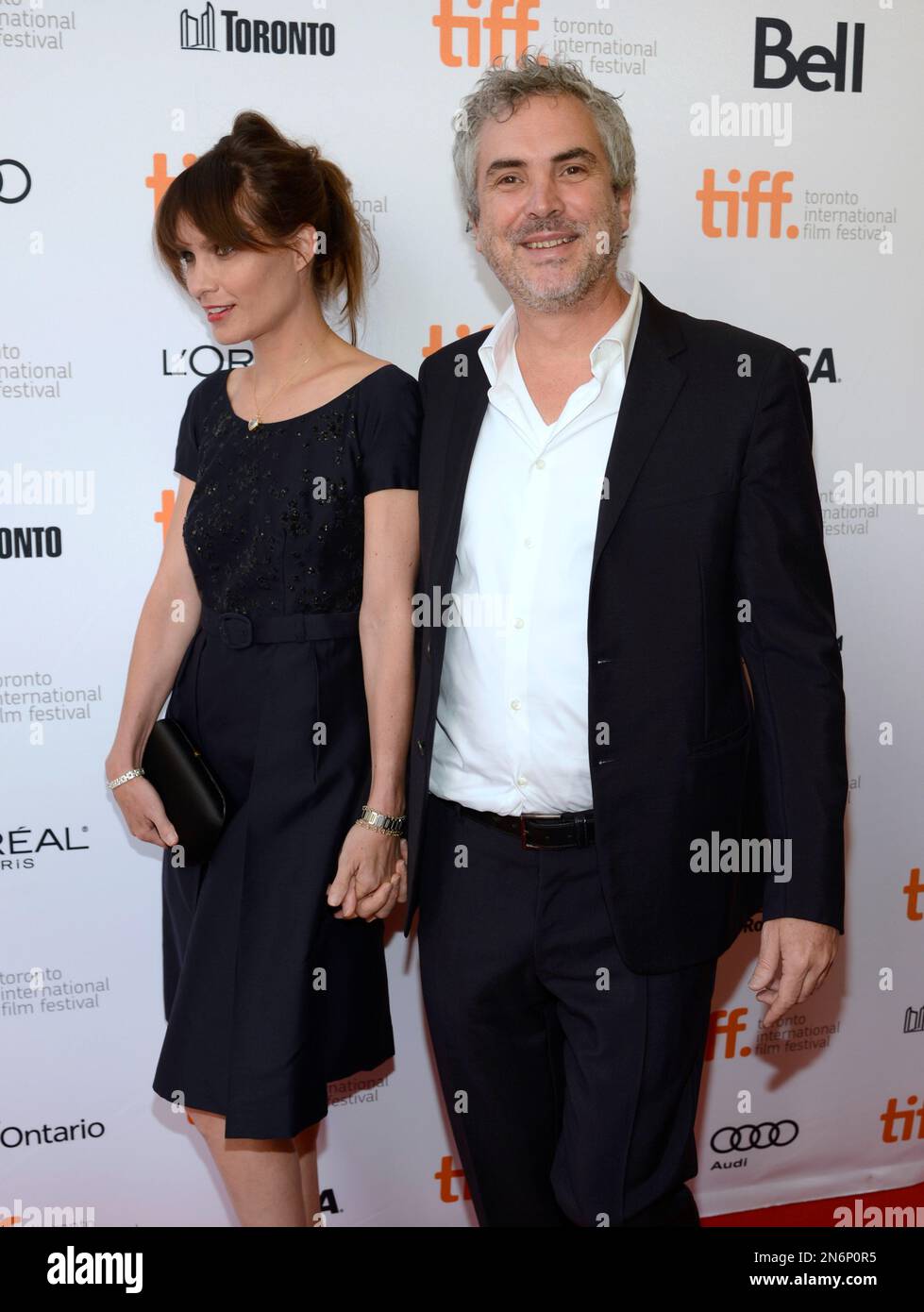 Director Alfonso Cuaron, right, and Sheherazade Goldsmith arrive at the ...