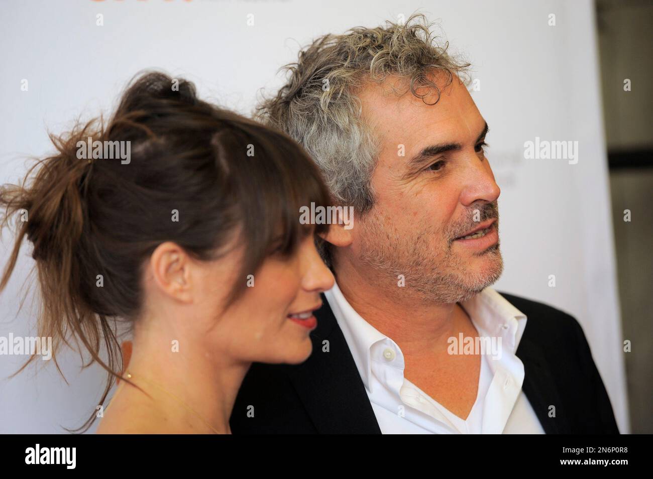 Director Alfonso Cuaron, right, and Sheherazade Goldsmith arrive at the ...