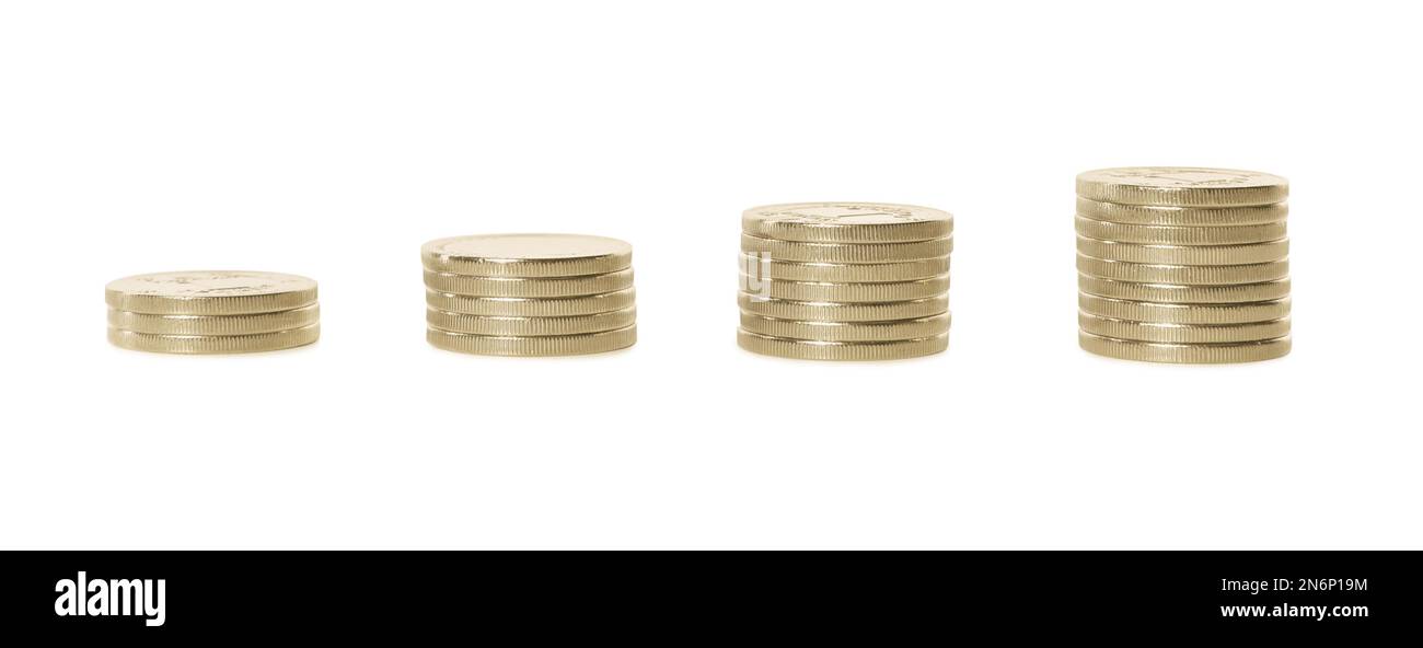 Stacked coins on white background. Investment concept Stock Photo - Alamy