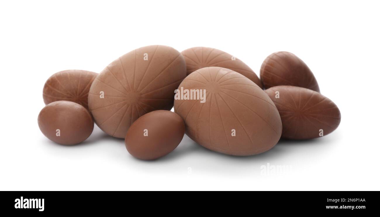 Many sweet chocolate eggs on white background Stock Photo - Alamy