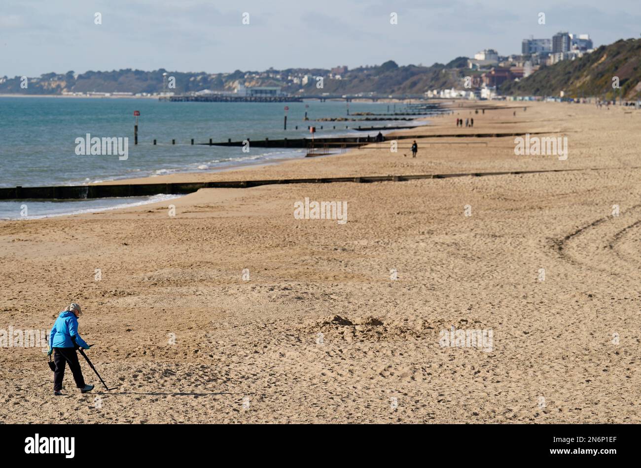 People make their way along Boscombe beach in Dorset. Picture date ...
