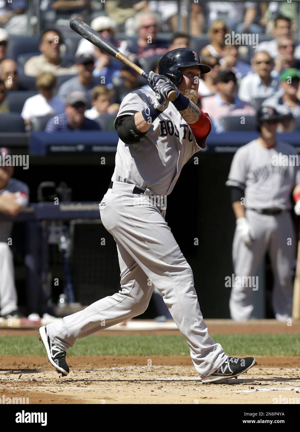 Boston Red Sox's Mike Carp hits an RBI-double during the second inning ...