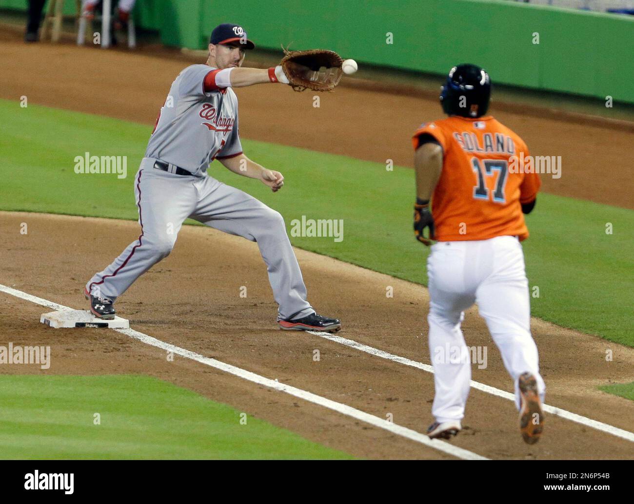 Washington Nationals first baseman Adam LaRoche puts out Miami Marlins ...