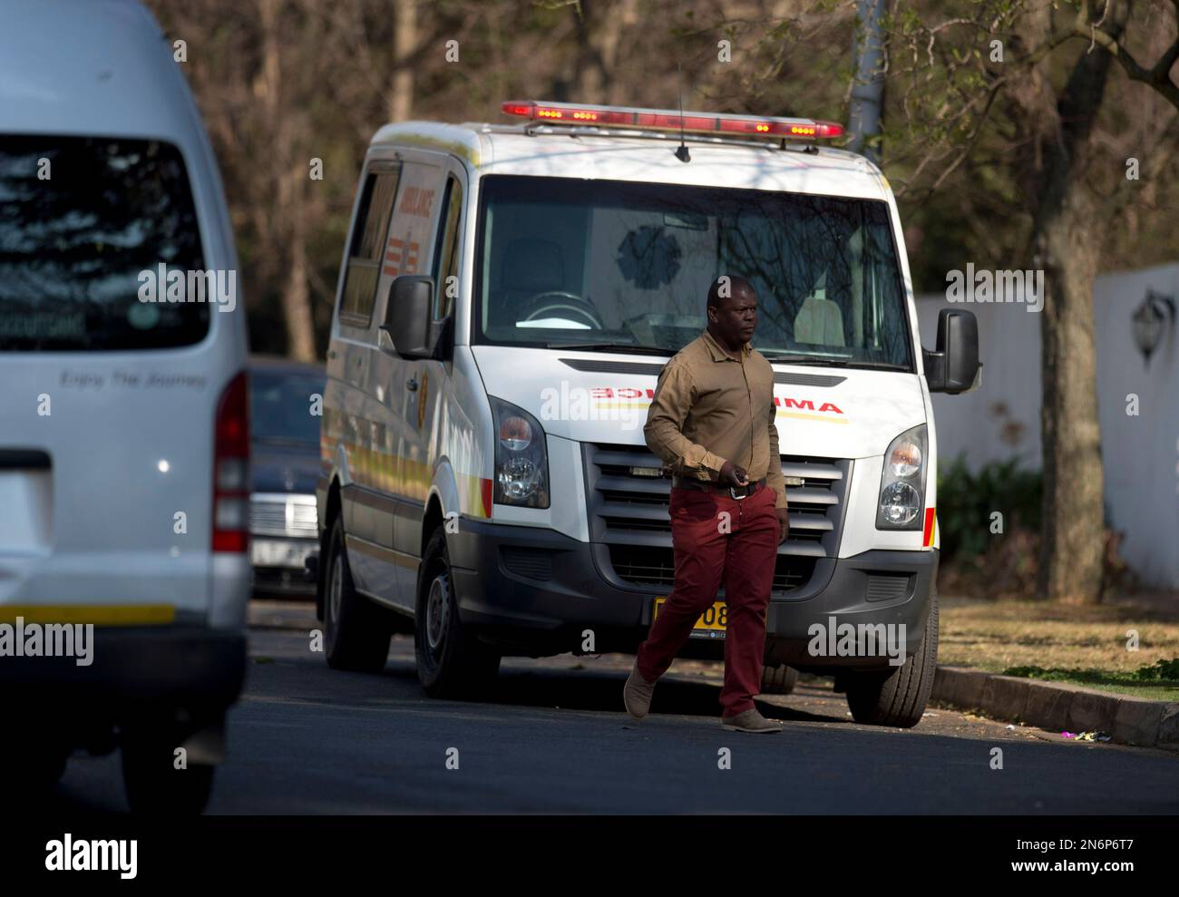 An ambulance driver walks into the house of former South African ...