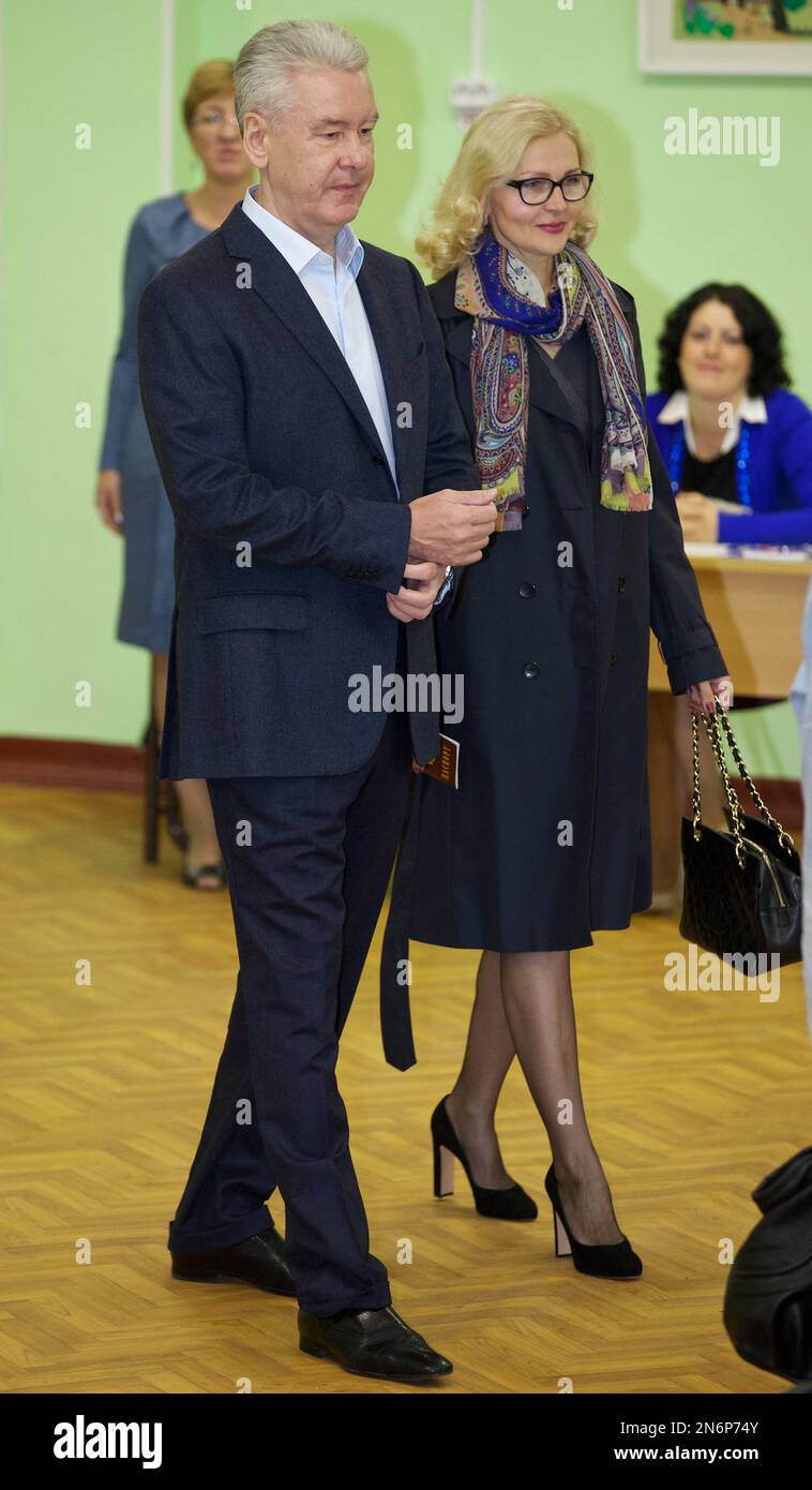 Moscow's acting mayor Sergei Sobyanin, left, and his wife Irina, arrive ...
