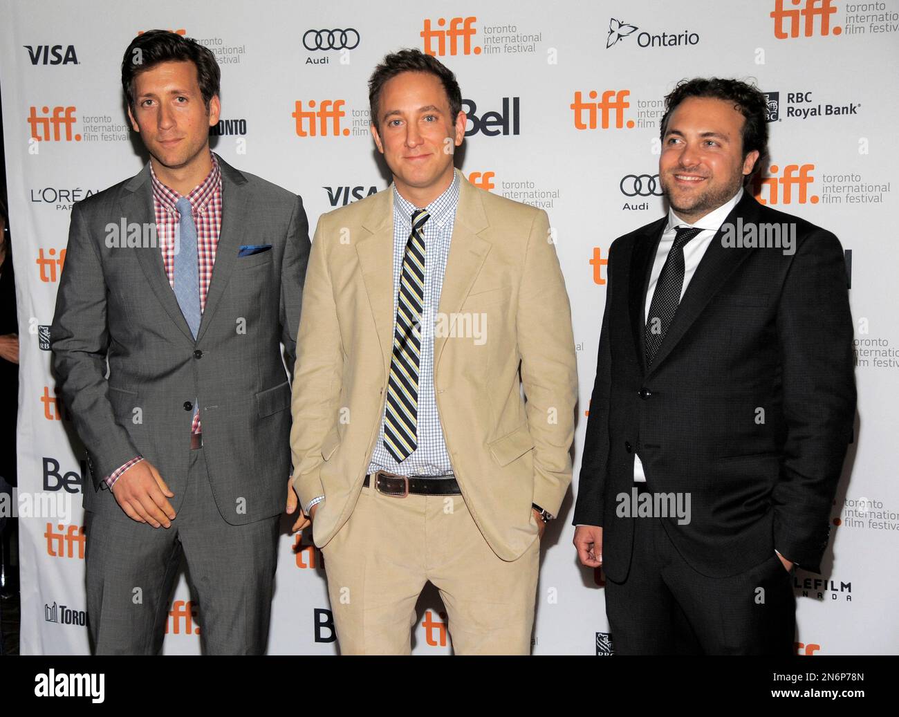 From left, producers Jeff Arkuss, Jesse Shapira and David Gross arrive ...