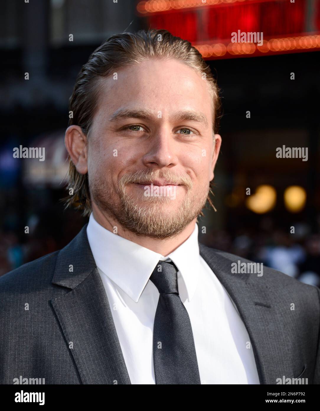 Actor Charlie Hunnam arrives on the red carpet at the season six ...