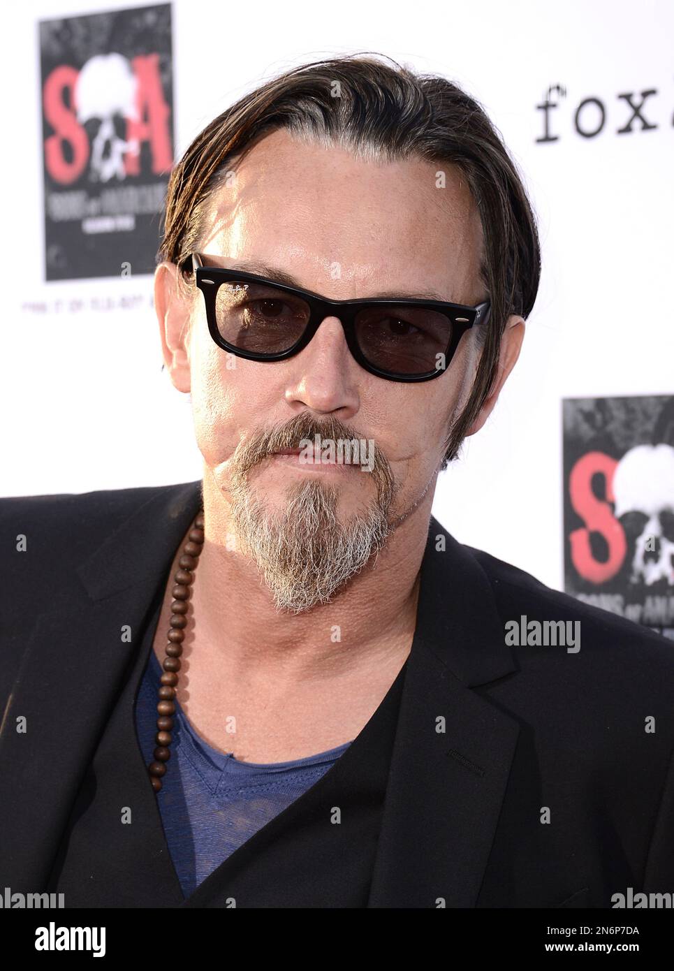 Actor Tommy Flanagan arrives on the red carpet at the season six ...