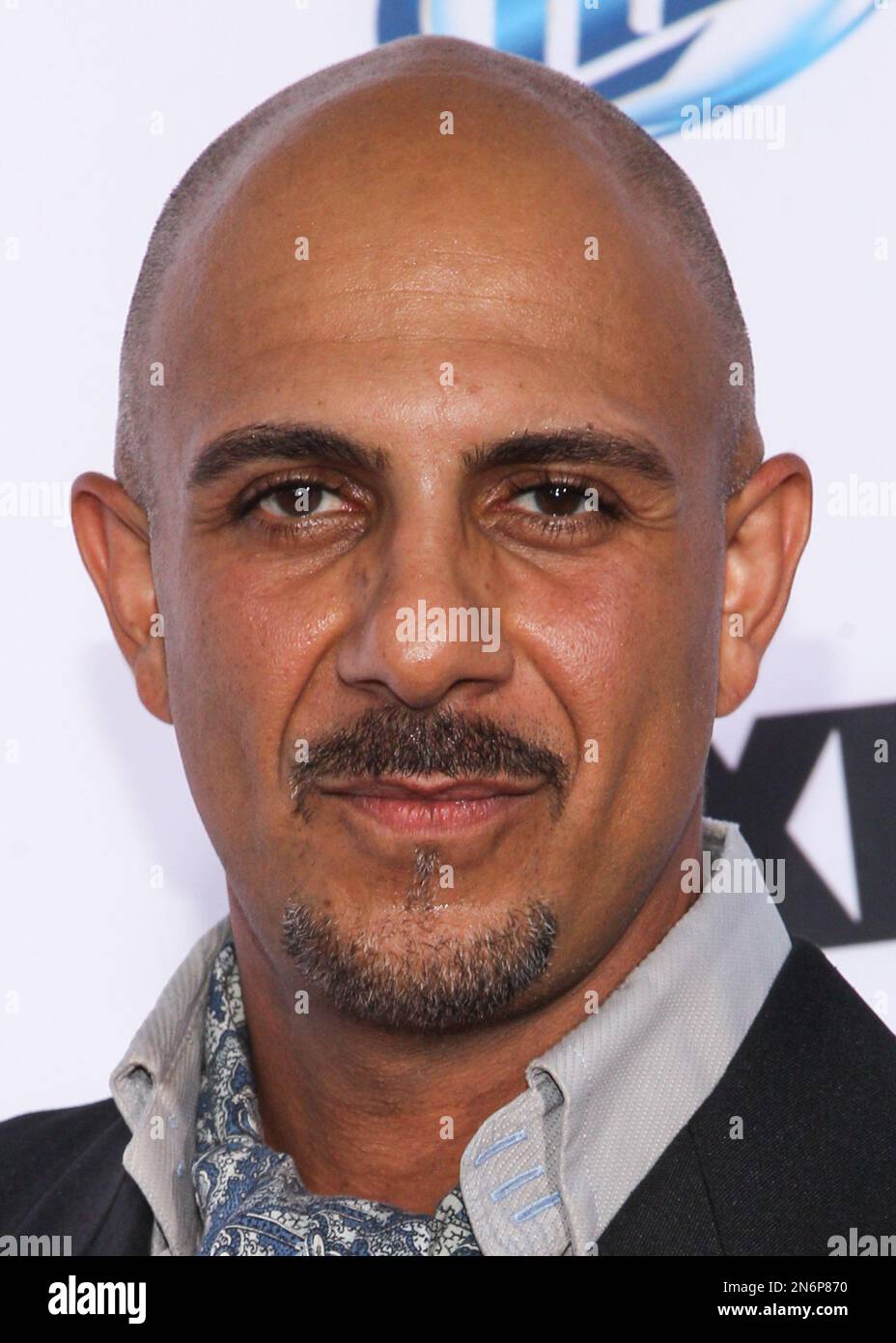Actor Anthony Azizi arrives at the season 6 premiere screening of "Sons ...
