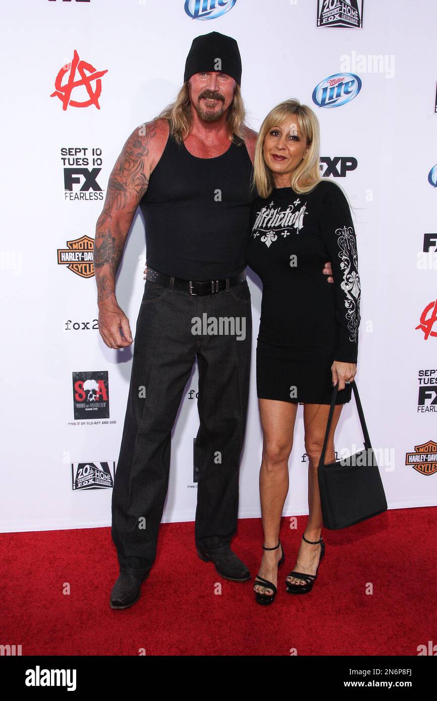 Rusty Coones and wife Katherine arrive at the season 6 premiere screening of "Sons of Anarchy ...