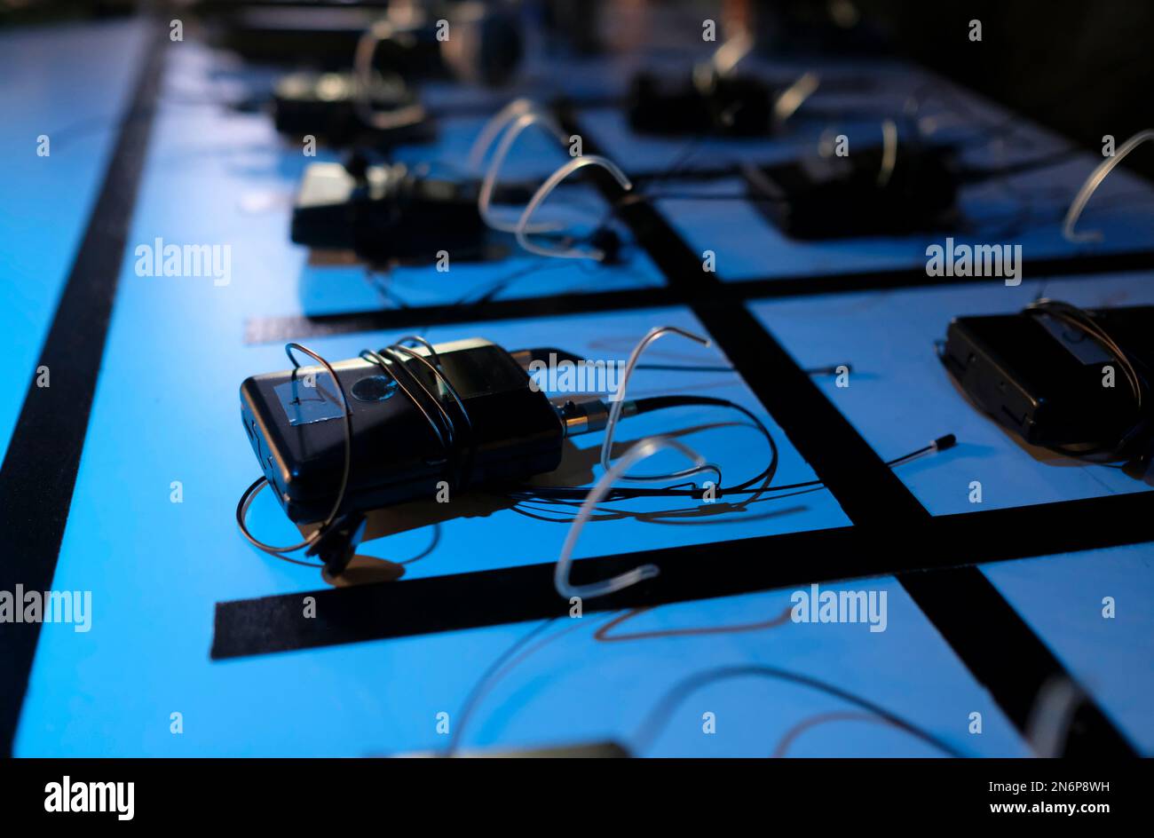 Clip-on microphones ready in the backstage area of a TV production ...