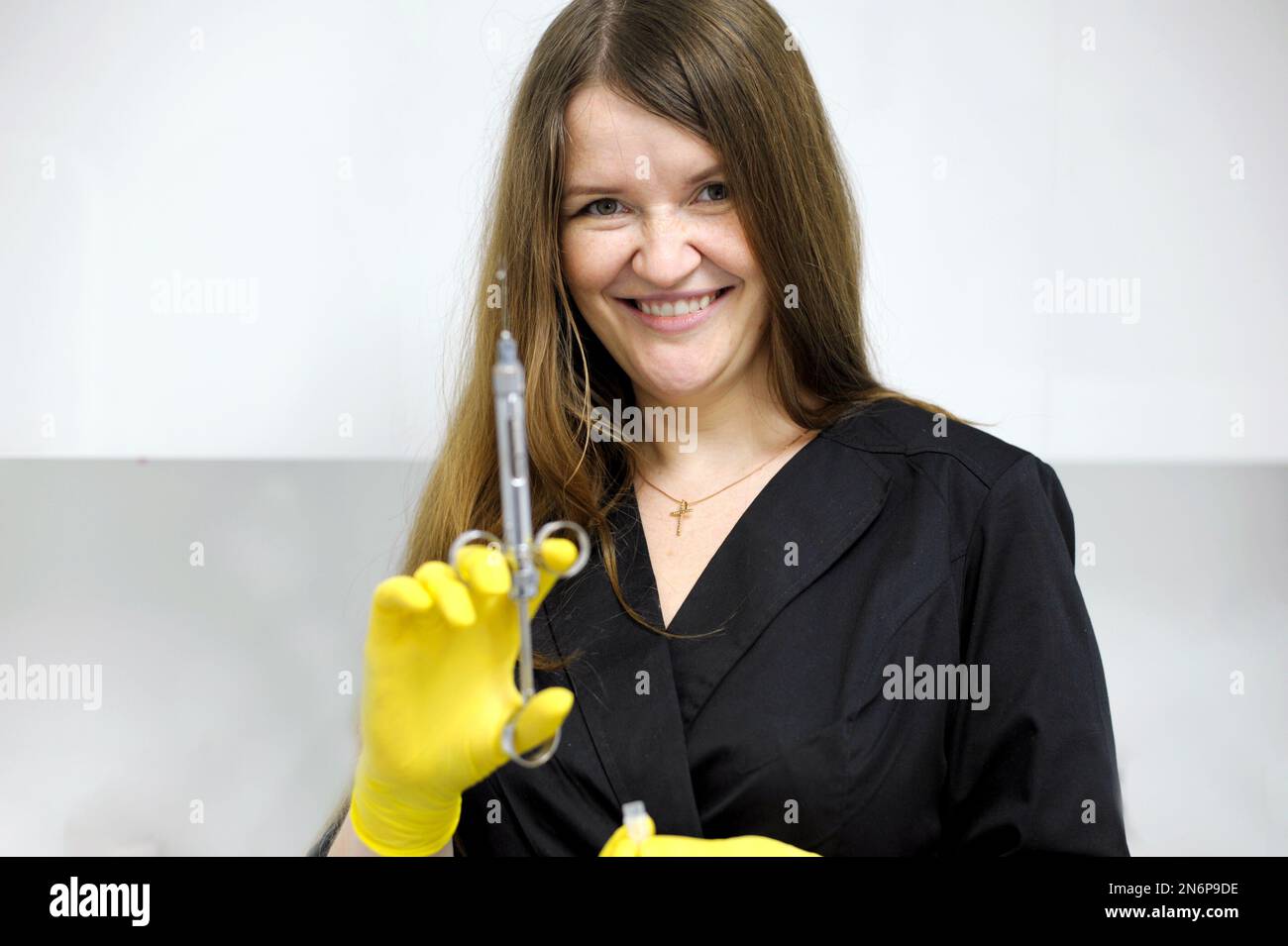 Doctor, girl, syringe injection Young girl woman with syringe in hand ...