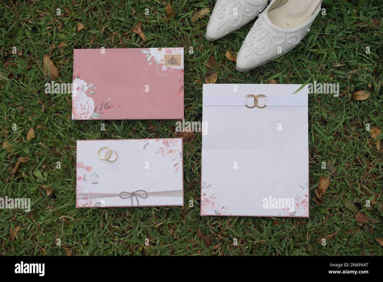 Beautiful Wedding Invitation Card with Rings, Flowers and Wedding Shoes ...