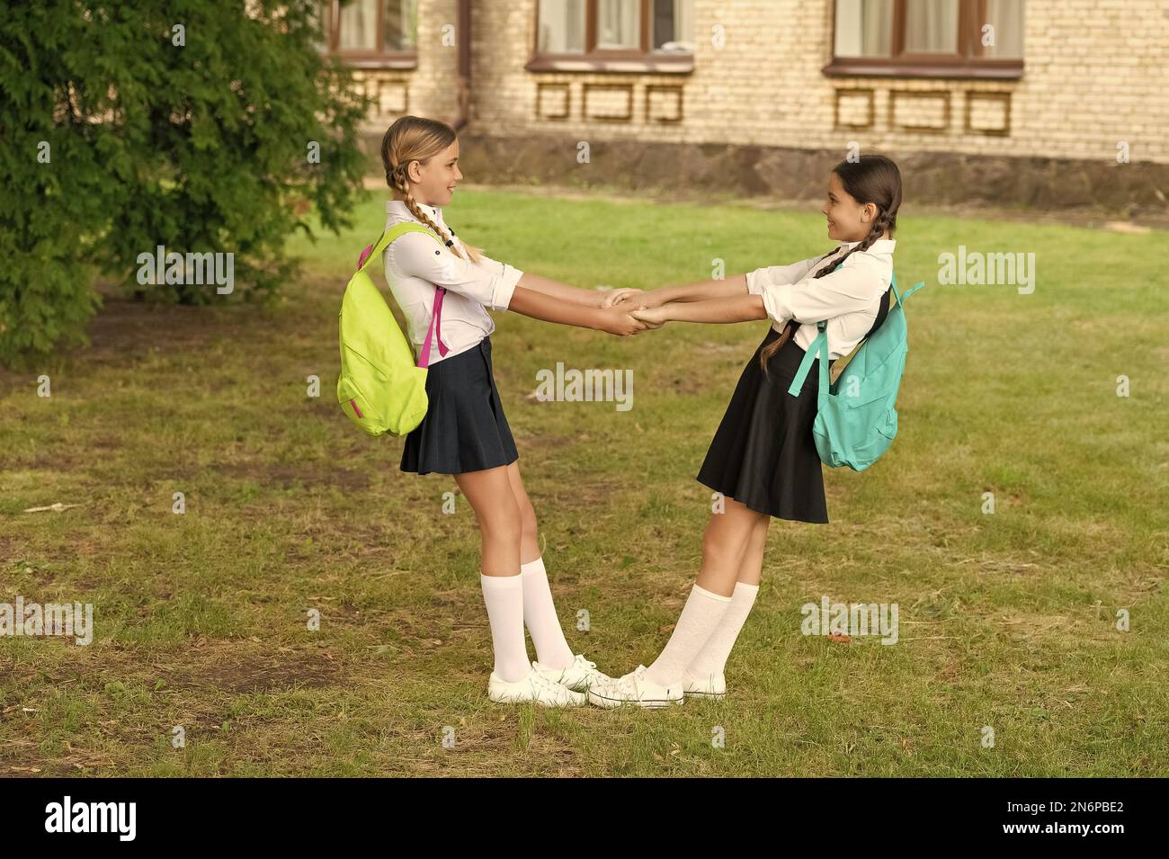 happy children dancing together in park after school Stock Photo - Alamy