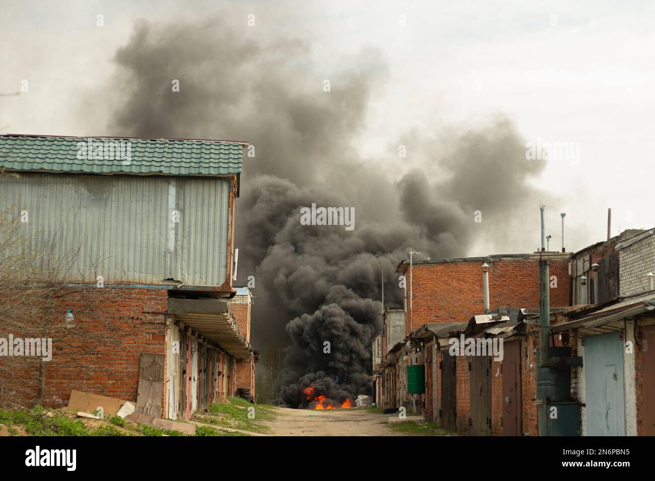 Fire in street. Smoke and fire. Landfill is burning. Environmental ...