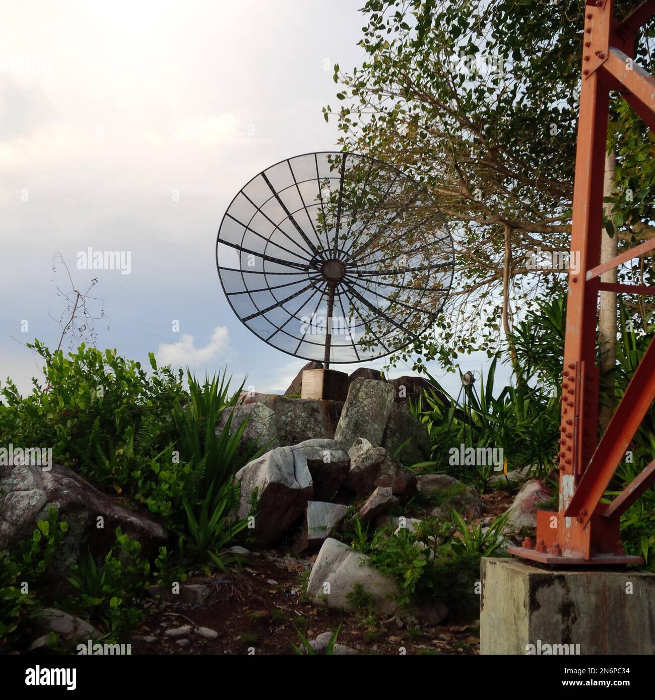 Satellite dish broken Stock Photo - Alamy