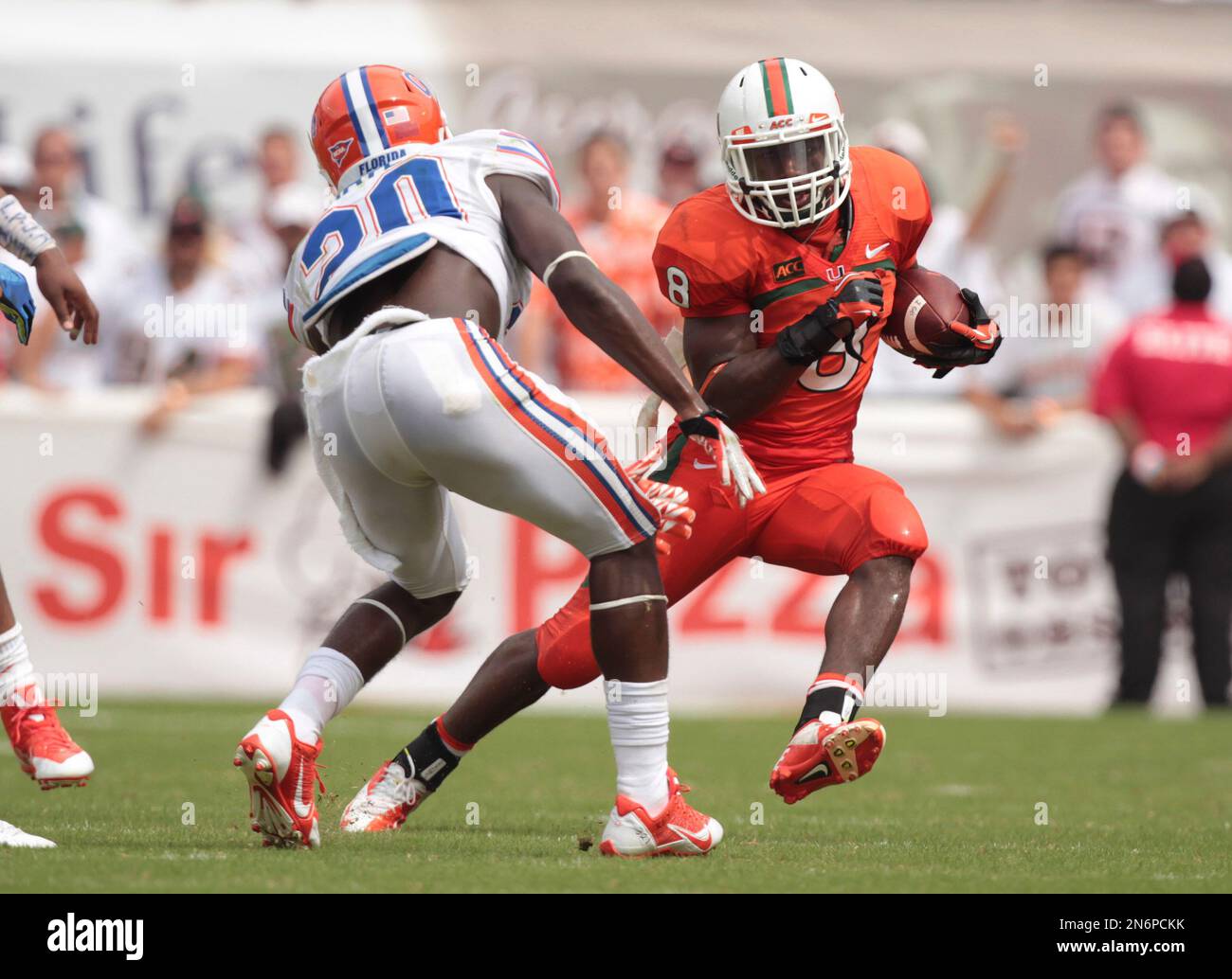Florida's Marcus Maye (20) tries to tackle Miami's Duke Johnson (8 ...