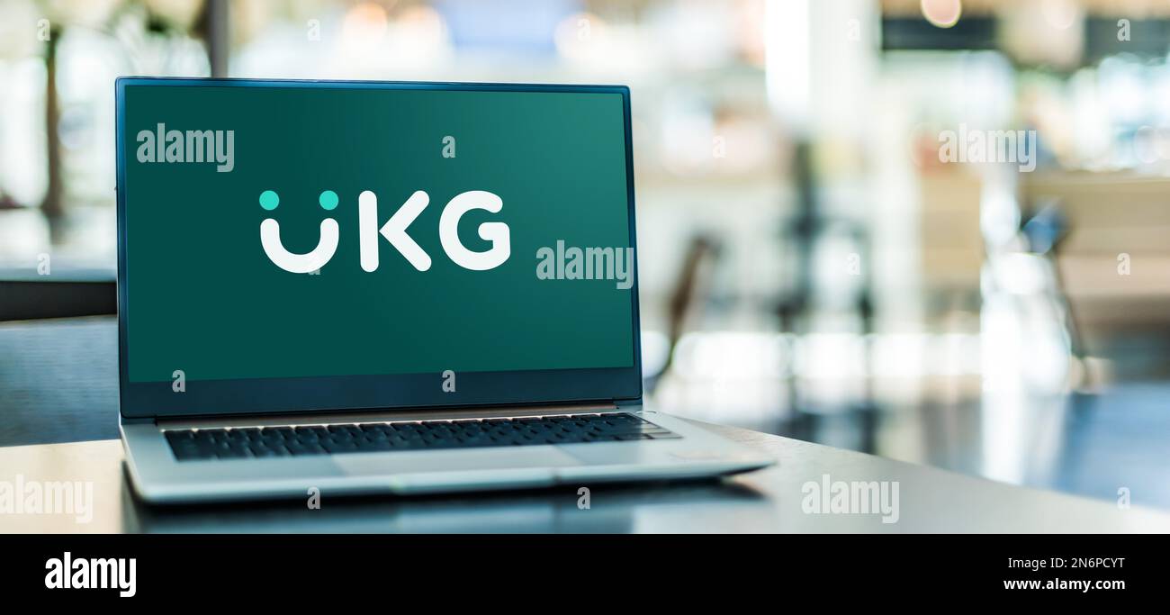 POZNAN, POL - DEC 28, 2022: Laptop computer displaying logo of UKG, a ...