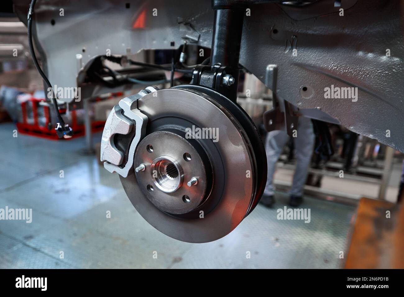 Assembled car suspension with brake mechanism in workshop Stock Photo ...