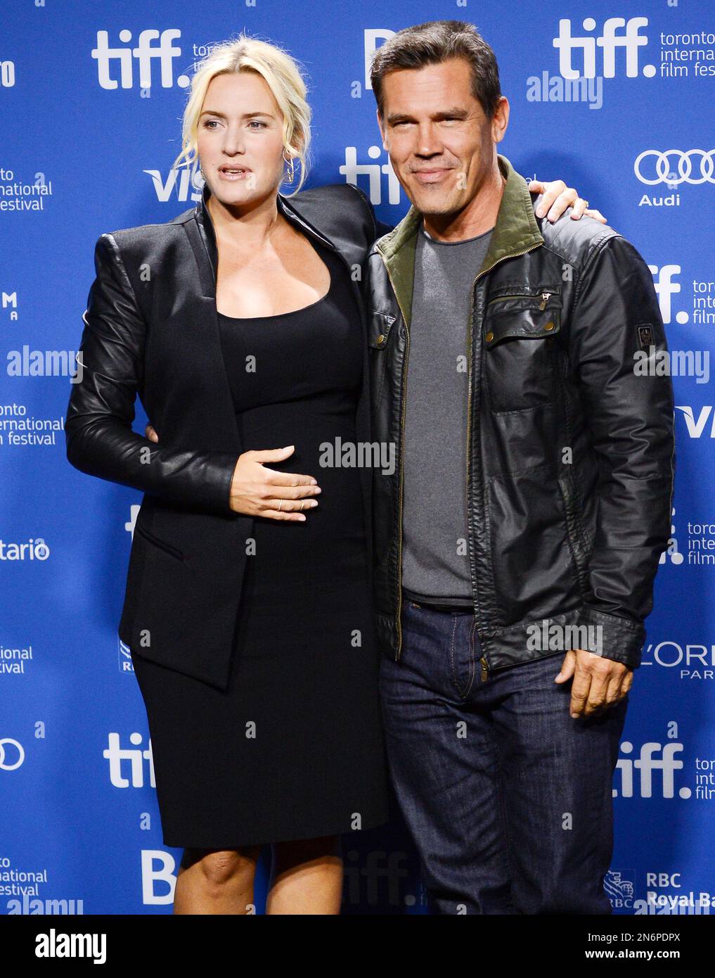 Actor Kate Winslet, left, and Josh Brolin participate in the press ...
