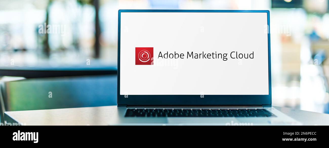 POZNAN, POL - JUN 21, 2022: Laptop computer displaying logo of Adobe Marketing Cloud (AMC), is a ...